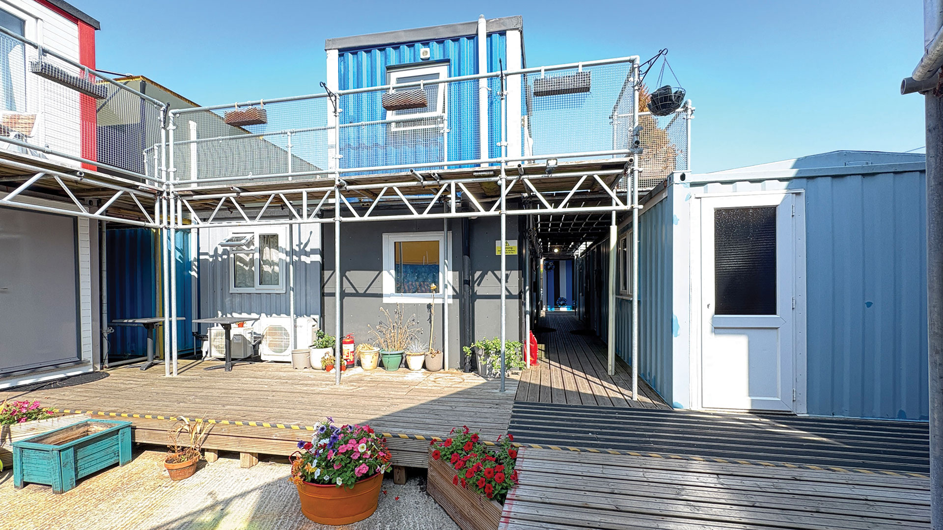 This charity converts shipping containers into homes for homeless ...